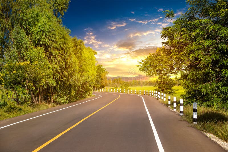 Local road at rural scene stock image. Image of curve - 128961949