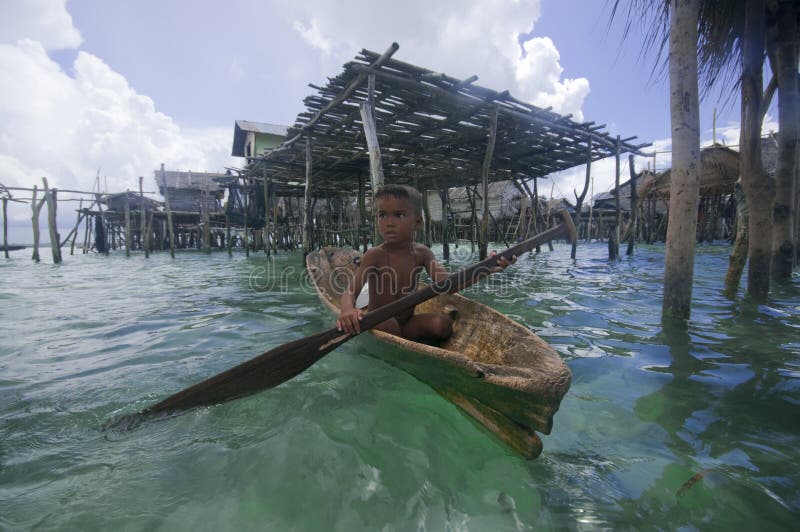 A local sea gypsy kid editorial photography. Image of bajau - 12833502