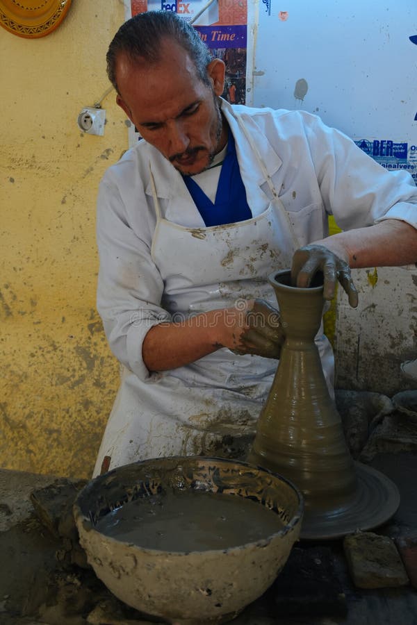 A Local Worker Forms a Ceramic Piece in Fez, Morocco. Editorial ...