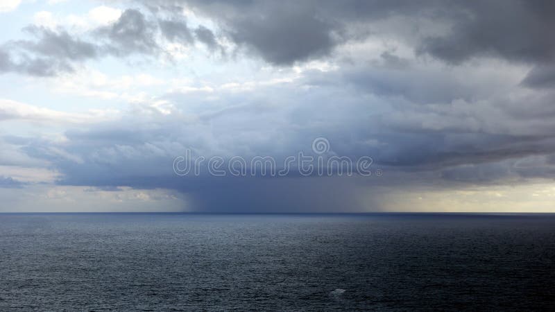 Localised Rain Storm Over Ocean Stock Photo - Image of clouds ...