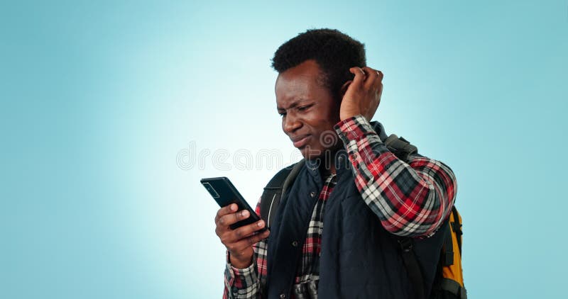 Location, Search and Lost Man with Phone in Studio with Map, Problem or ...