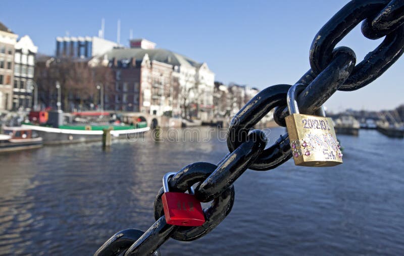 Lock on Amsterdam bridge stock image. Image of chain - 30796653