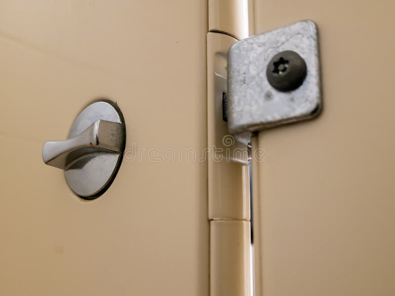 A lock on a bathroom stall stock photo. Image of entrance - 276543992