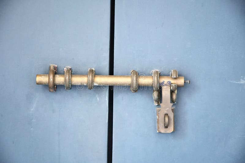 Lock Bolt on Blue Metal Gate Stock Photo - Image of safeguard, rusty ...