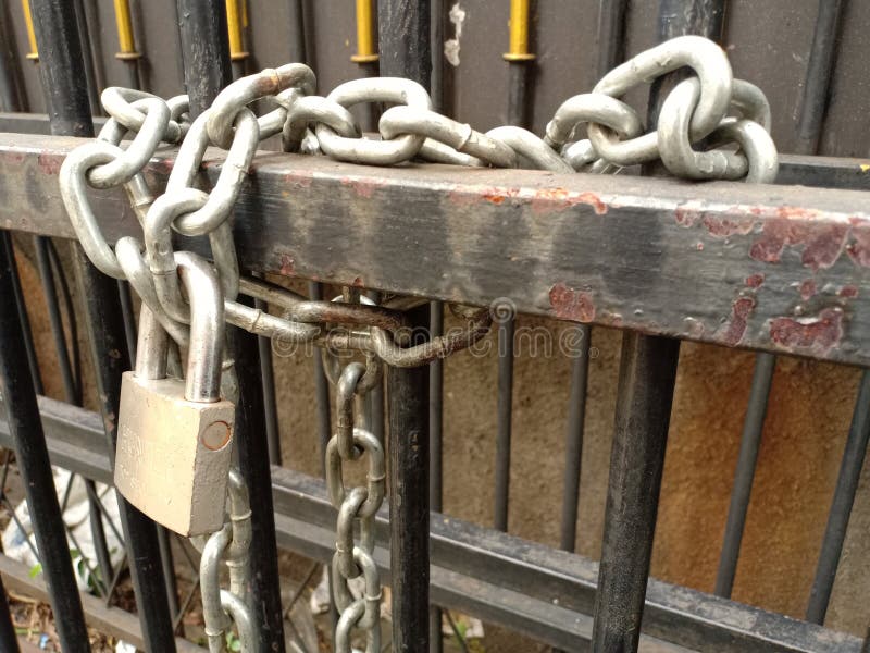 Lock and Chain on the Iron Fence Stock Image - Image of wood, carving ...