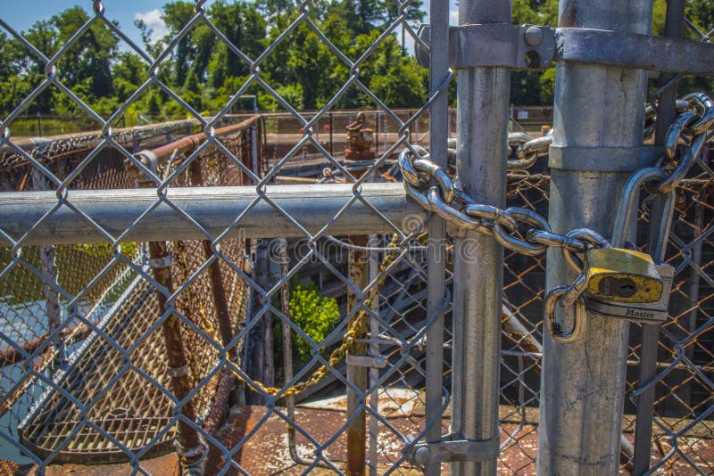 Lock and Dam Loacked Gates and Chains Stock Image - Image of steel ...