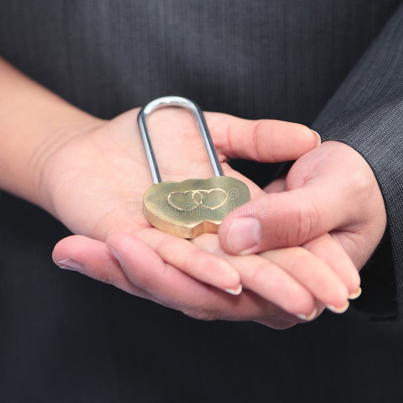 The lock in hands stock photo. Image of friendship, life - 34427332