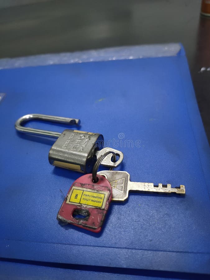 Lock and Key in the Map Table Editorial Photography - Image of table ...