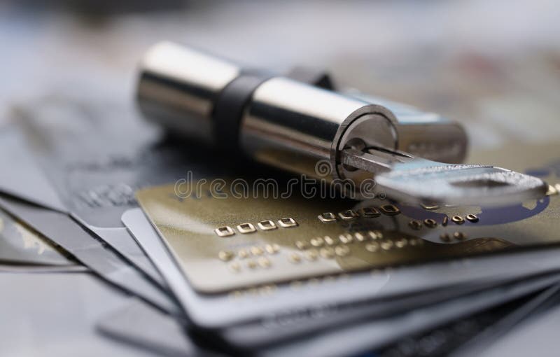 Lock with Key Rests on Plastic Credit Cards Stock Photo - Image of ...