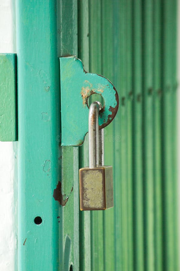 The Lock Key is on the Steel Door Loop Stock Image - Image of locked ...