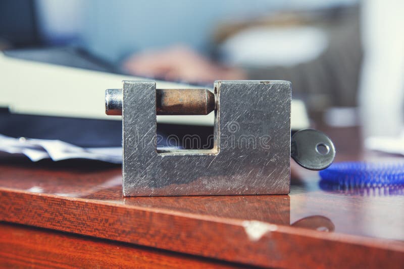 Lock with key on desk stock photo. Image of metal, security - 170316548