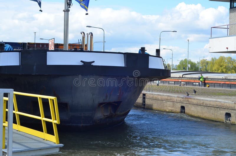 The Lock is Open and the Cargo Ship is Sailing Further Stock Photo ...
