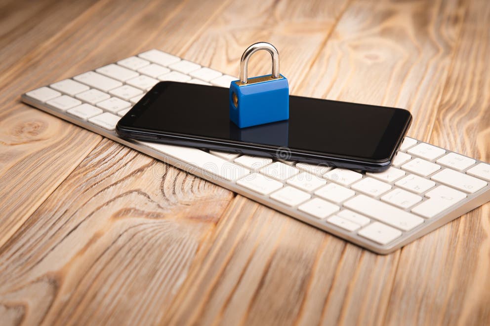 Lock on phone on keyboard stock photo. Image of crime - 351684774
