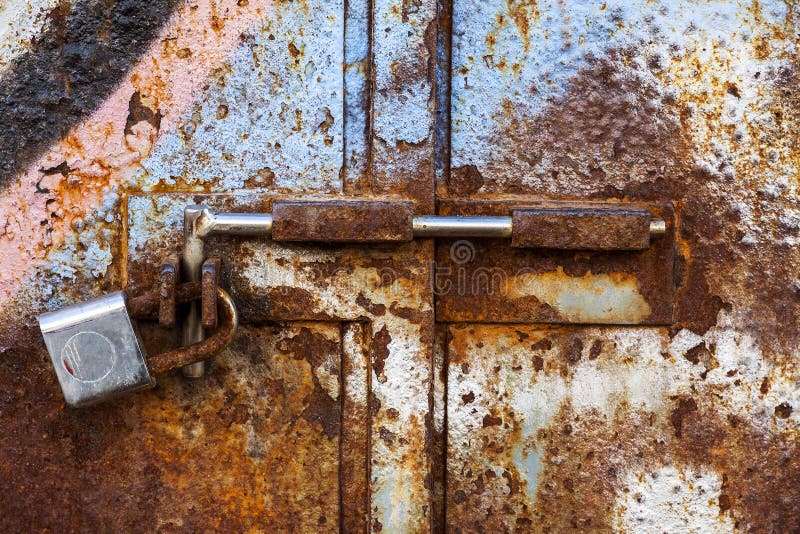 Lock on rusty iron door stock image. Image of prison - 27456777