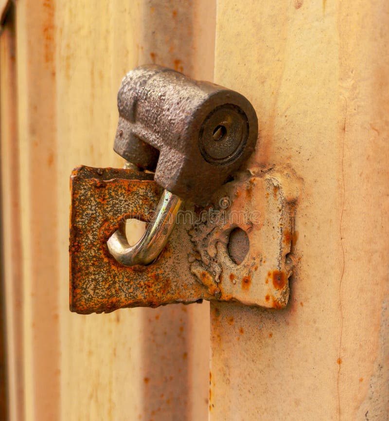 Lock on a Rusty Metal Garage Stock Image - Image of gate, vintage ...