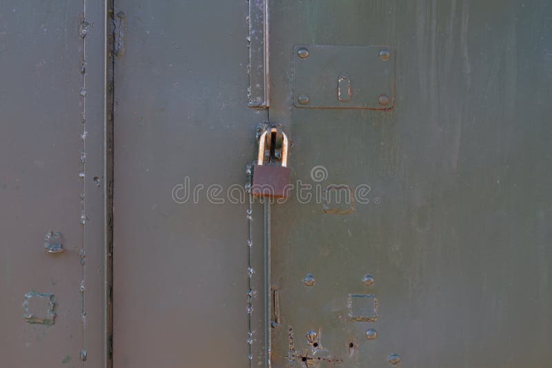 The Lock on the Rusty Metal Gate on the Garage Stock Image - Image of ...