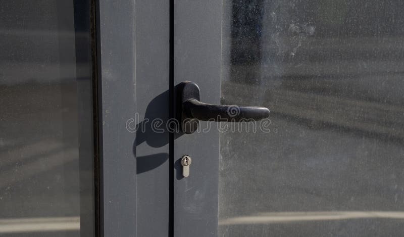 Lock on a warehouse doors stock photo. Image of door - 366848128