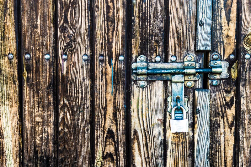 Lock on the wooden door stock photo. Image of protection - 54288828