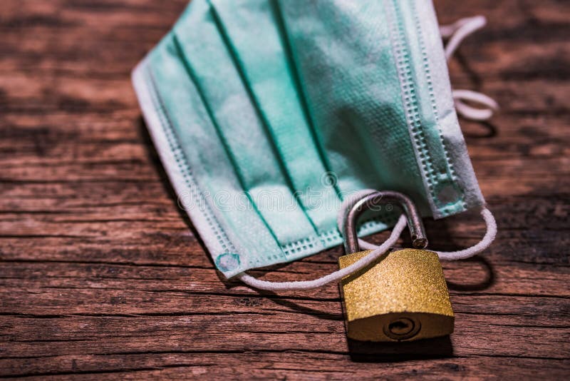 Lockdown Sign with Padlock on Surgical Mask Stock Photo - Image of home ...