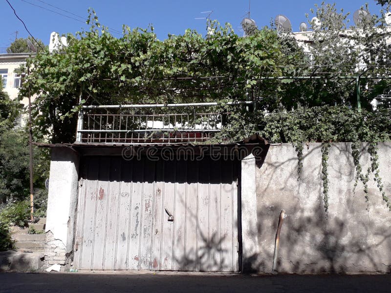 Garage Under the Veranda with Vineyard. Stock Image - Image of gates ...
