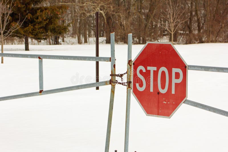 Locked Gate with a Stop Sign Stock Photo - Image of park, gate: 38671258