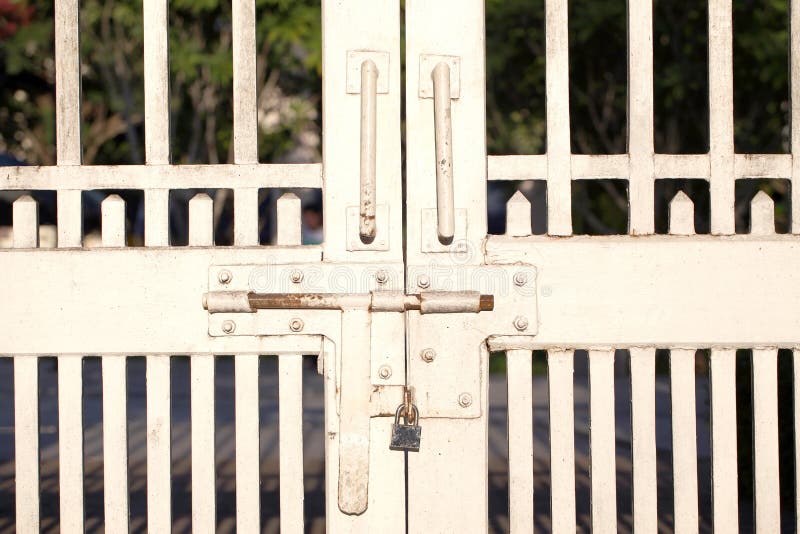 Locked Gate stock image. Image of barrier, white, gate - 44970199