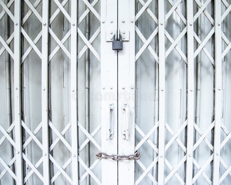 Locked White Iron Fence Gate Pattern Stock Image - Image of glass, iron ...