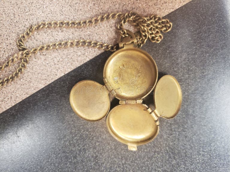 Locket 4 way stock photo. Image of chain, brass, locket - 227721364