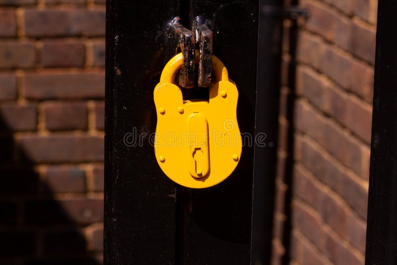 Yellow Security Padlock in Use Stock Image - Image of single, simple ...