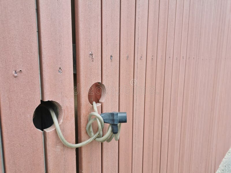 Locking Security Cable Tied between Two Wooden Doors Stock Image ...