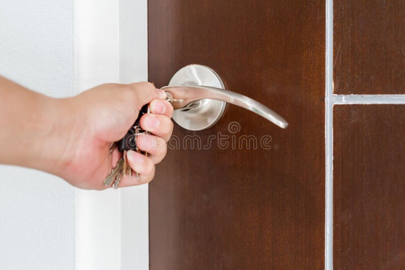Locking or Unlocking Door with Key by Hand Stock Image - Image of hotel ...