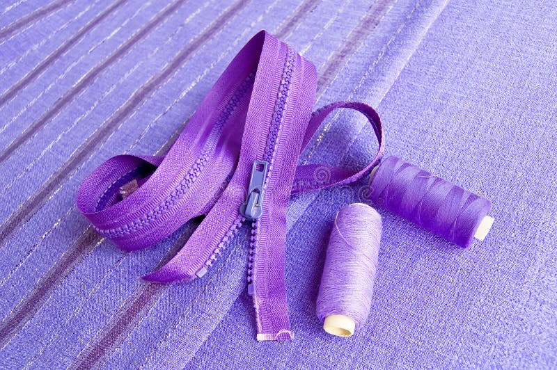 Locking Zipper and Thread on the Purple Fabric Stock Image - Image of ...