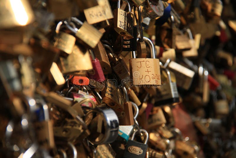 Locks on a bridge in paris stock photo. Image of locks - 40799630