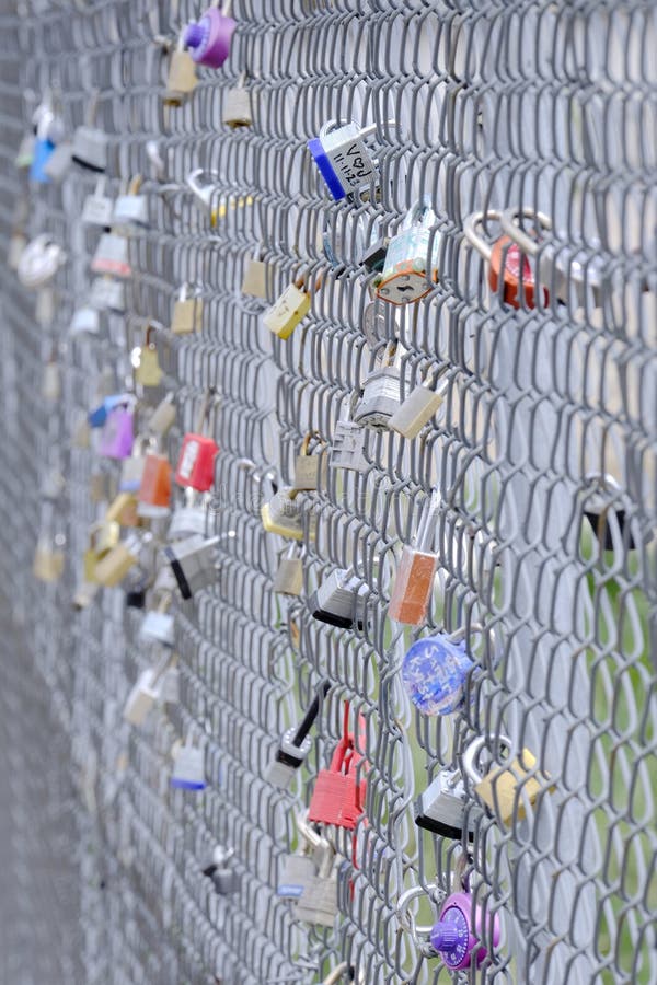 Locks on Chain Link Fence Representing Love and Commitment for Couple ...