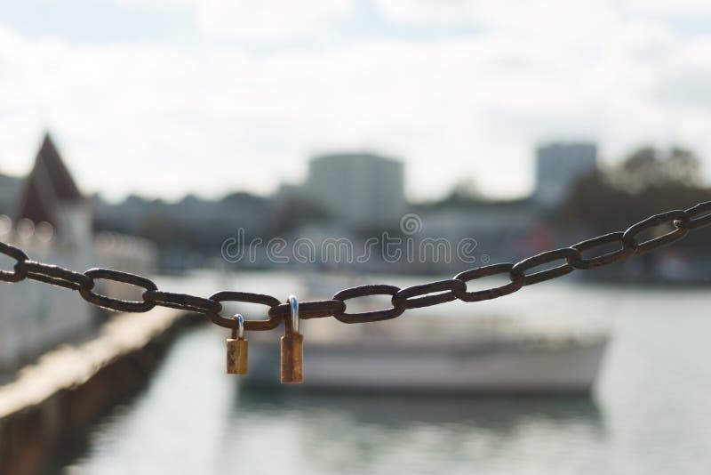 Locks on the chain stock image. Image of security, river - 46048735