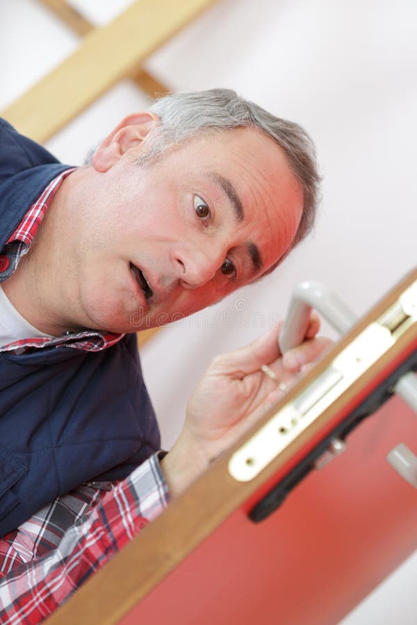 Checking the Door Frame for Evenness of the Surface after Installation ...