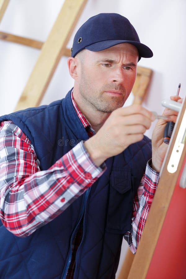 Locksmith Man Fix Bathroom Door by Screwdriver Stock Image - Image of ...