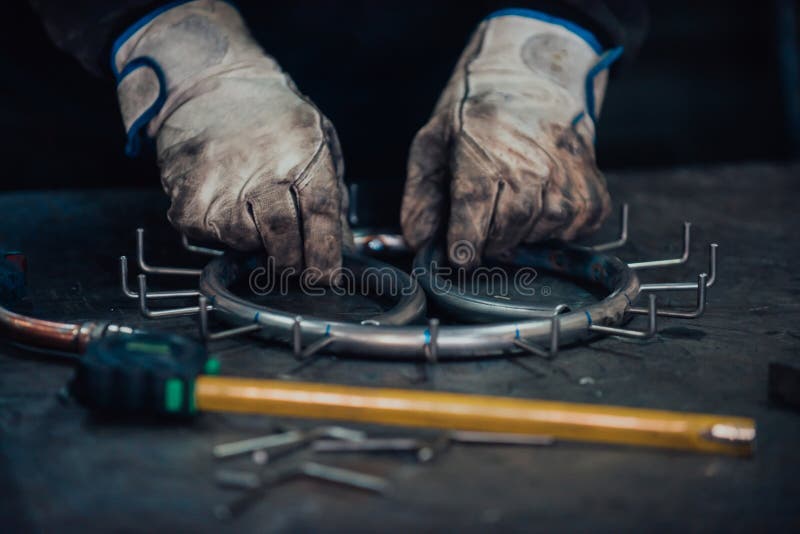 The Locksmith Measures the Pieces of Steel and Preparing Them for ...