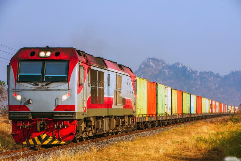 Locomotive with Cargo Container Train on the Railway. Stock Photo ...