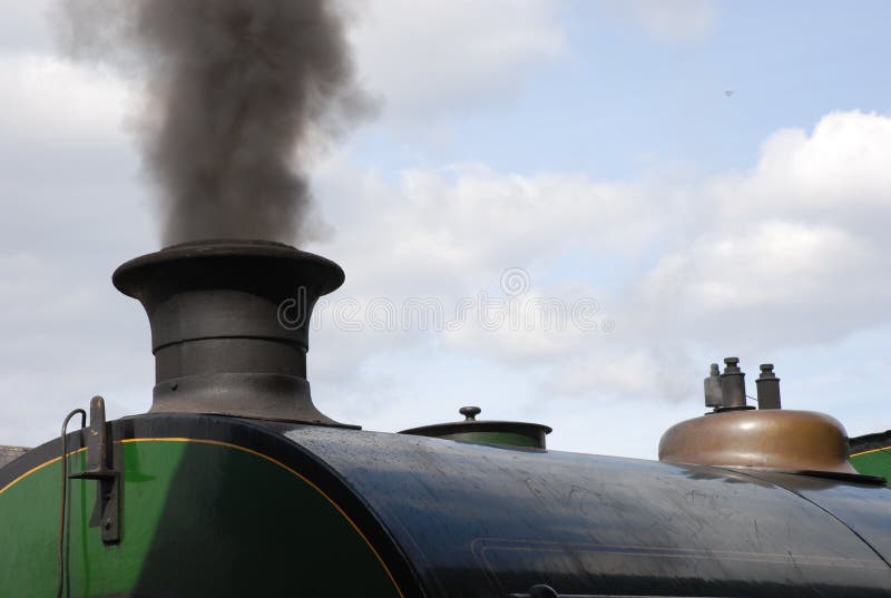 Funnel Of A Steam Train Emitting Smoke Stock Photo - Image of amongst ...