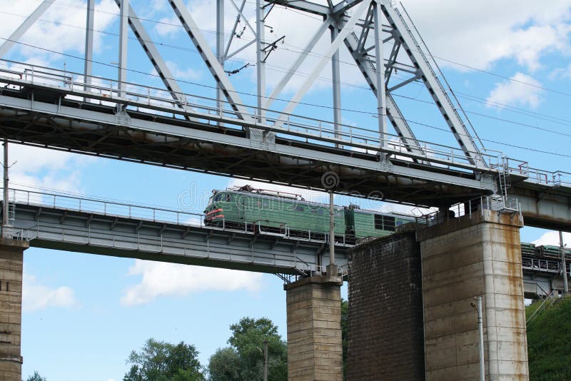 Locomotive of the Train Goes Over the Bridge Over the Bridge Stock ...
