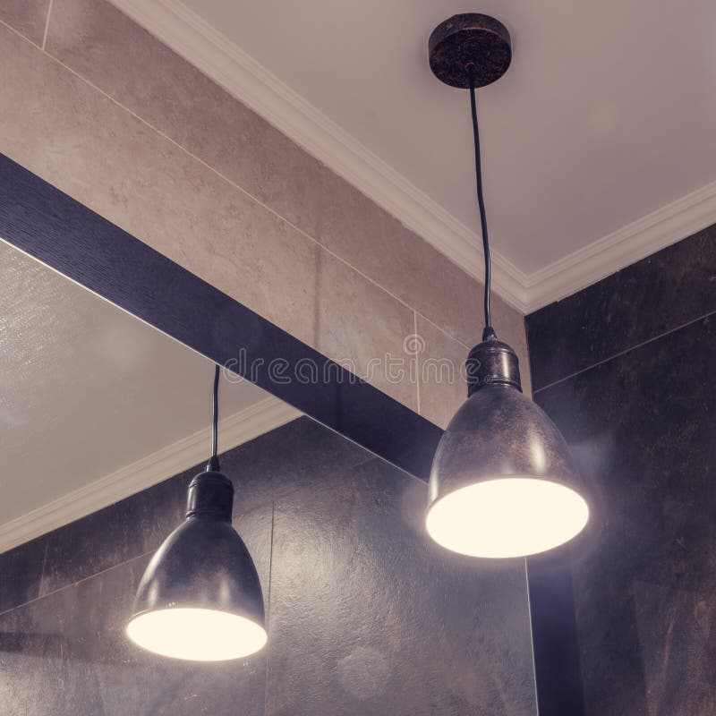 Loft Industrial Ceiling Lamp Hanging from a Warehouse Roof with Mirror ...