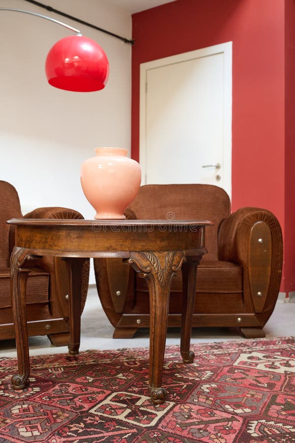 Loft with Old Fashionned Table and Sofa Against White Wall Stock Image ...