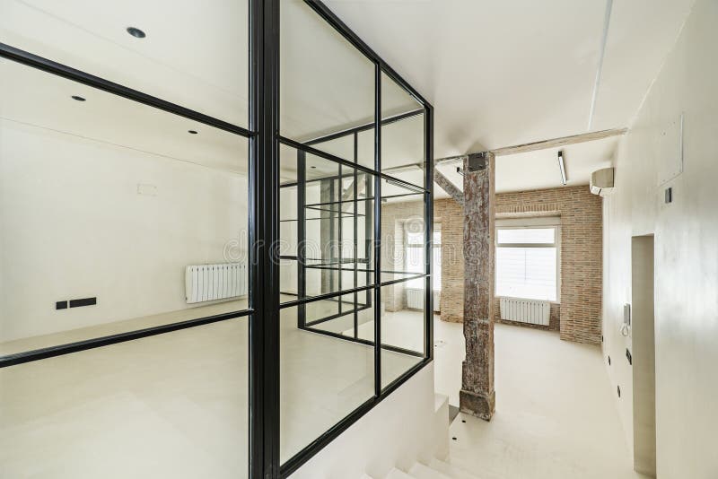 Loft Studio with Room with Metal and Glass Enclosure with Many Corners ...
