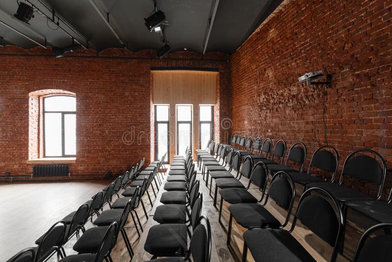 Loft Style. Hall with Black Chairs for Webinars and Conferences Stock ...