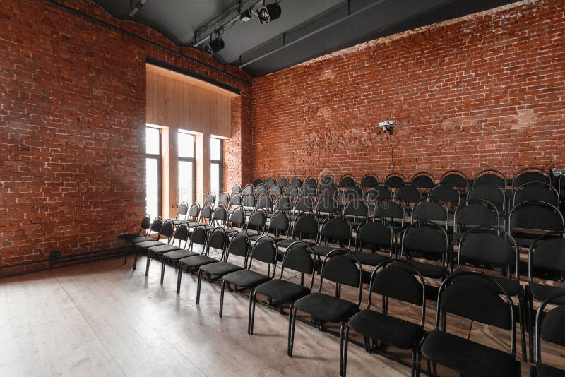 Loft Style. Hall with Black Chairs for Webinars and Conferences Stock ...
