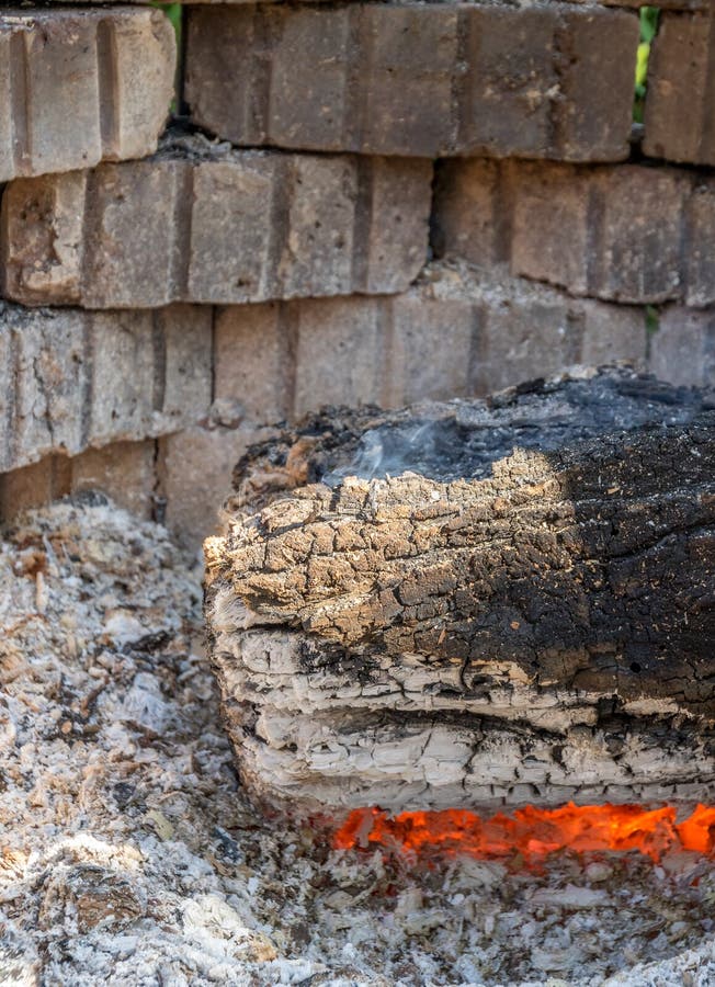 Log burning in a fireplace stock image. Image of book - 189061611