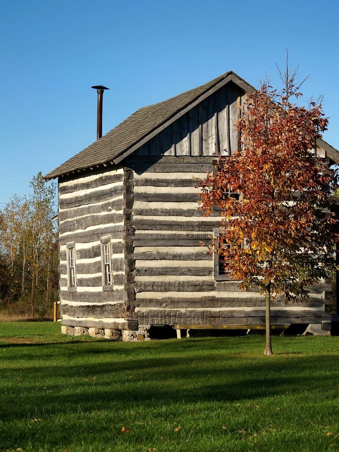Log Cabin in Autumn stock photo. Image of leaves, brown - 10441838