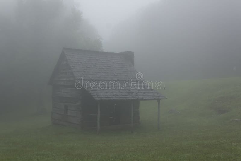 Log cabin in fog stock photo. Image of color, cabin, mountain - 81914420