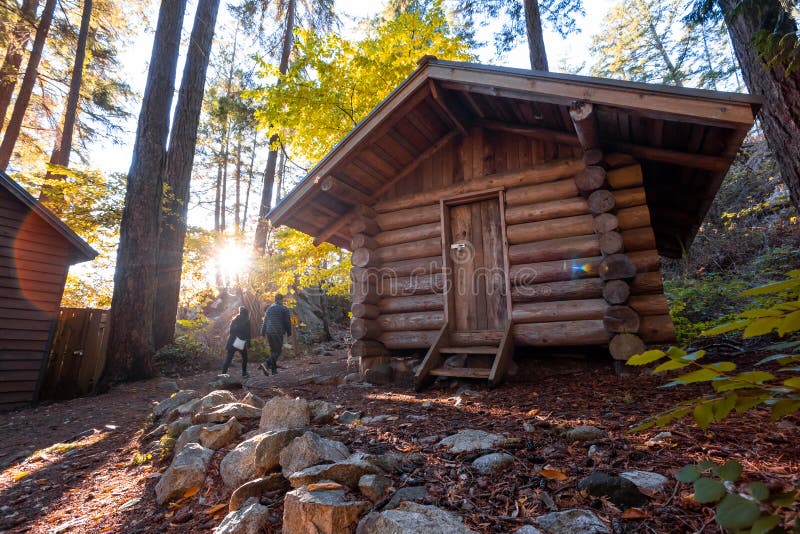 Log Cabin in a Forest in the Autumn in Lighthouse Park. Stock Photo ...